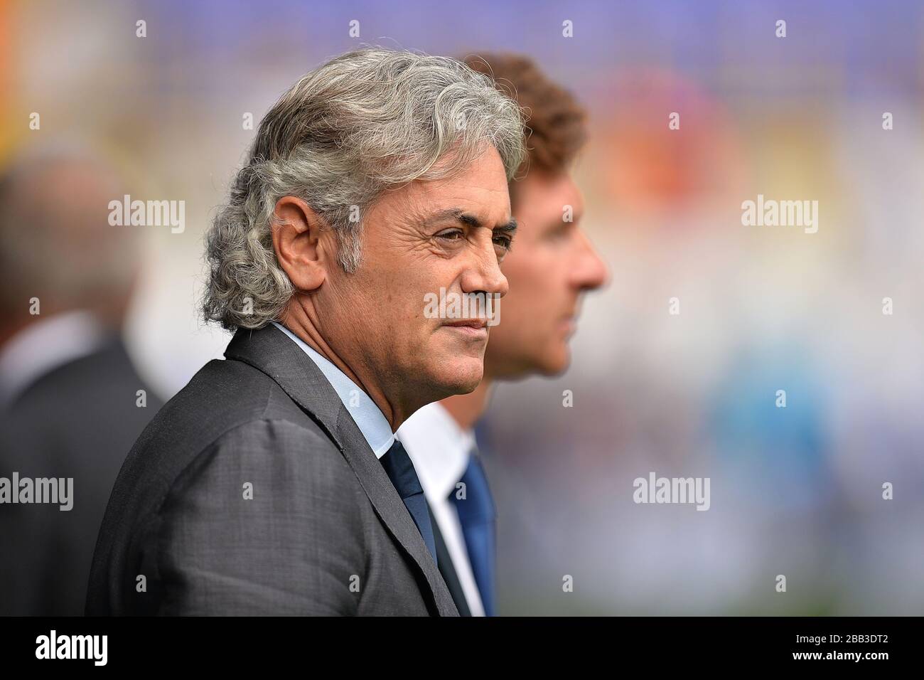 Tottenham Hotspur Technical Director Franco Baldini (front) stands with ...