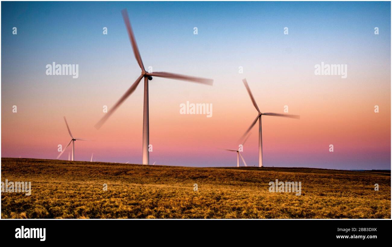 Wind turbines turning Stock Photo - Alamy