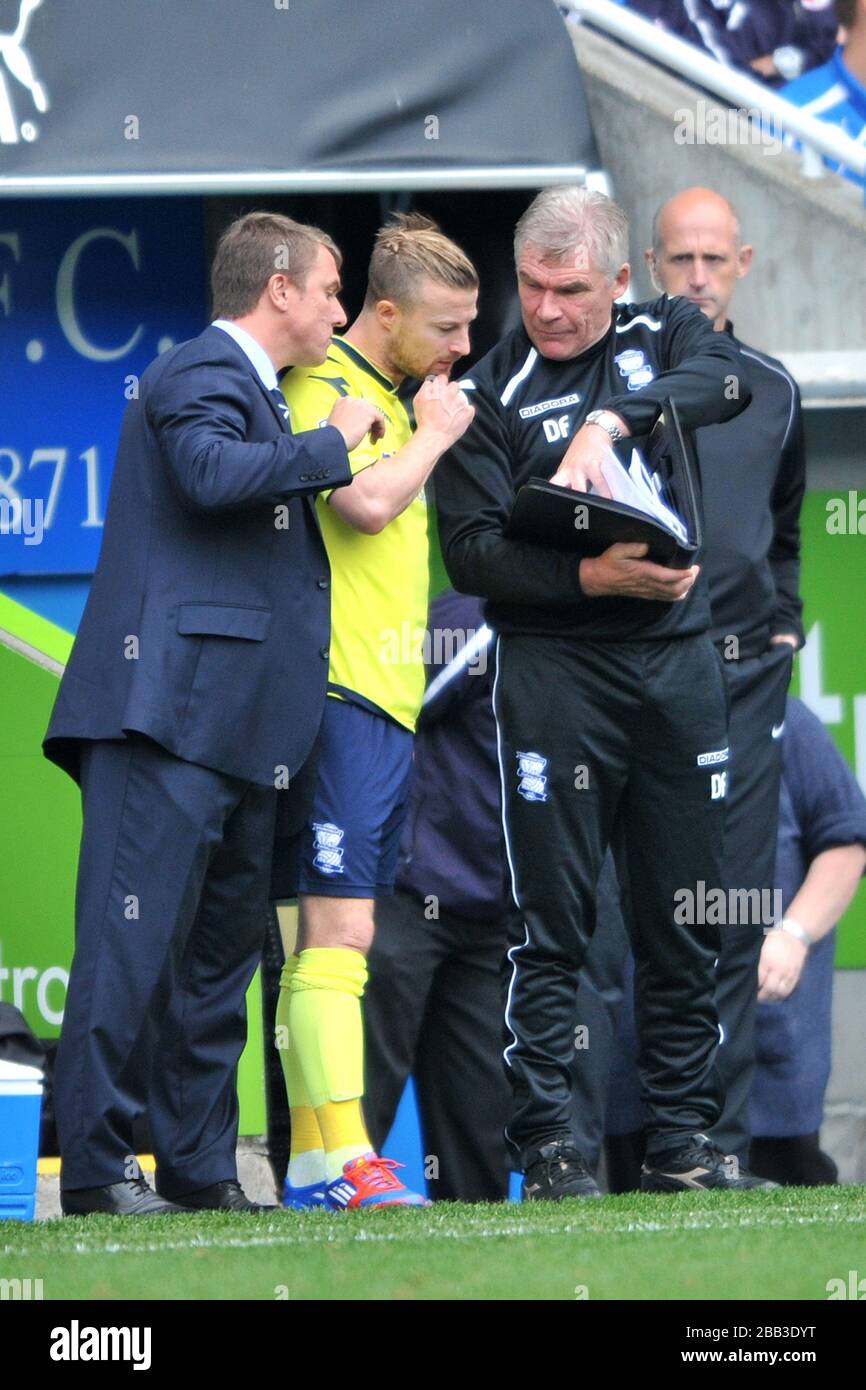 Birmingham City manager Lee Clark (left) Wade Elliott and coach Derek ...