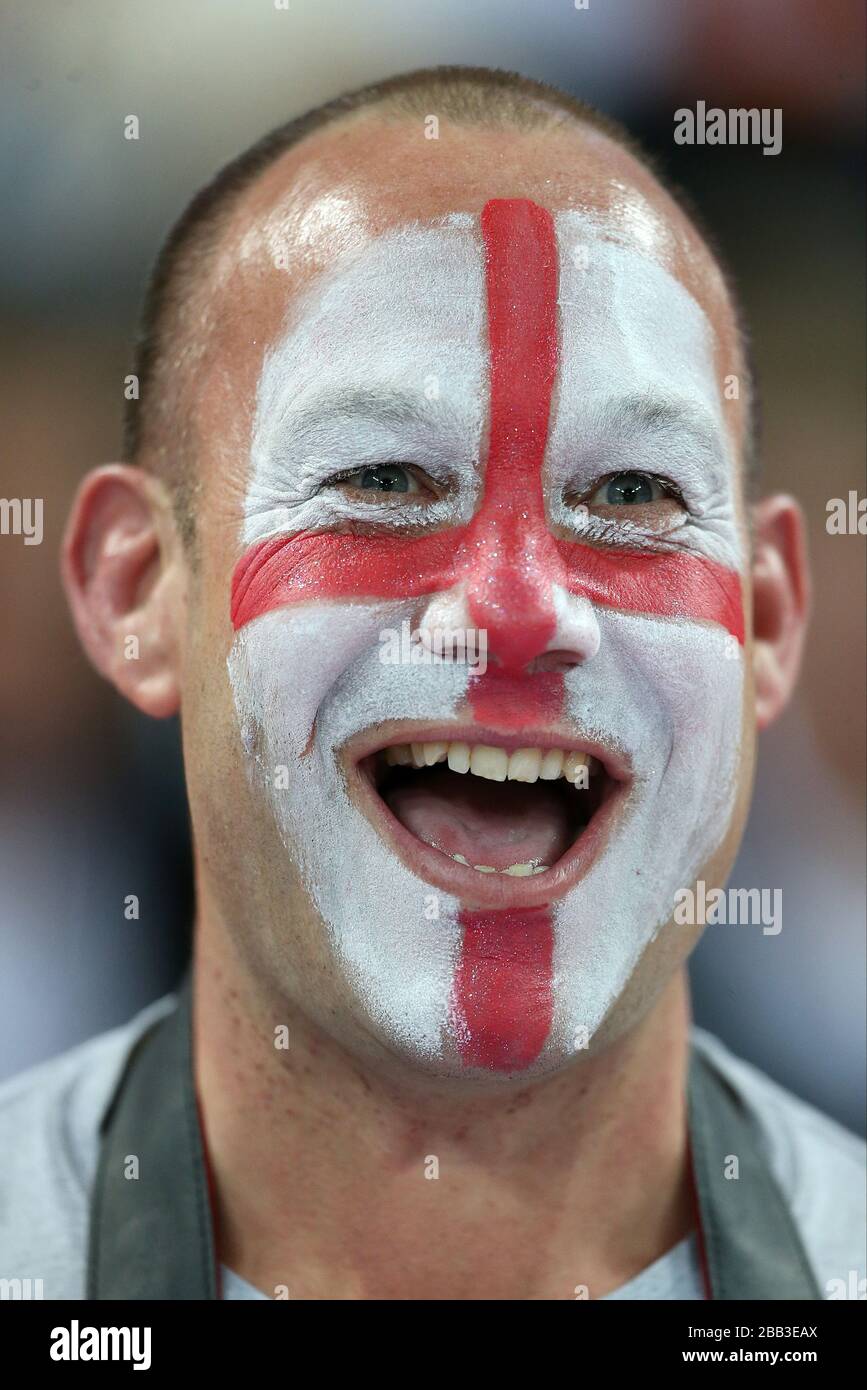 An England fan shows off their face paint in the stands at Wembley ...