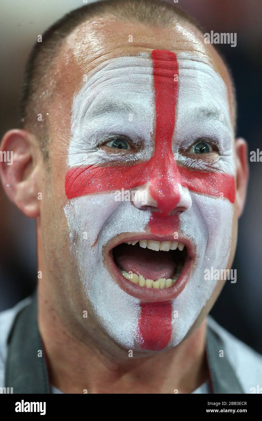 An England fan shows off their face paint in the stands at Wembley ...