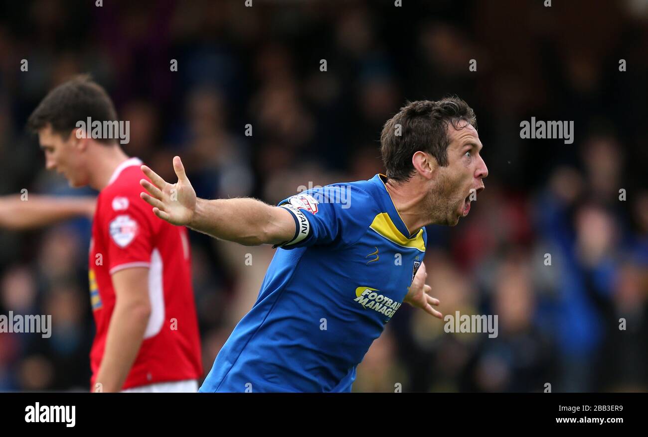 AFC Wimbledon's Alan Bennett celebrates scoring their equalising goal ...