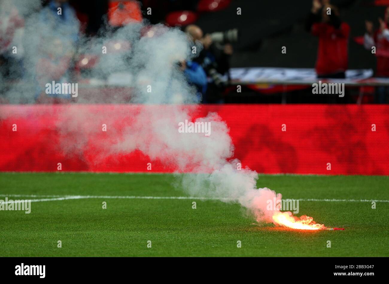 A red flare on the pitch Stock Photo - Alamy