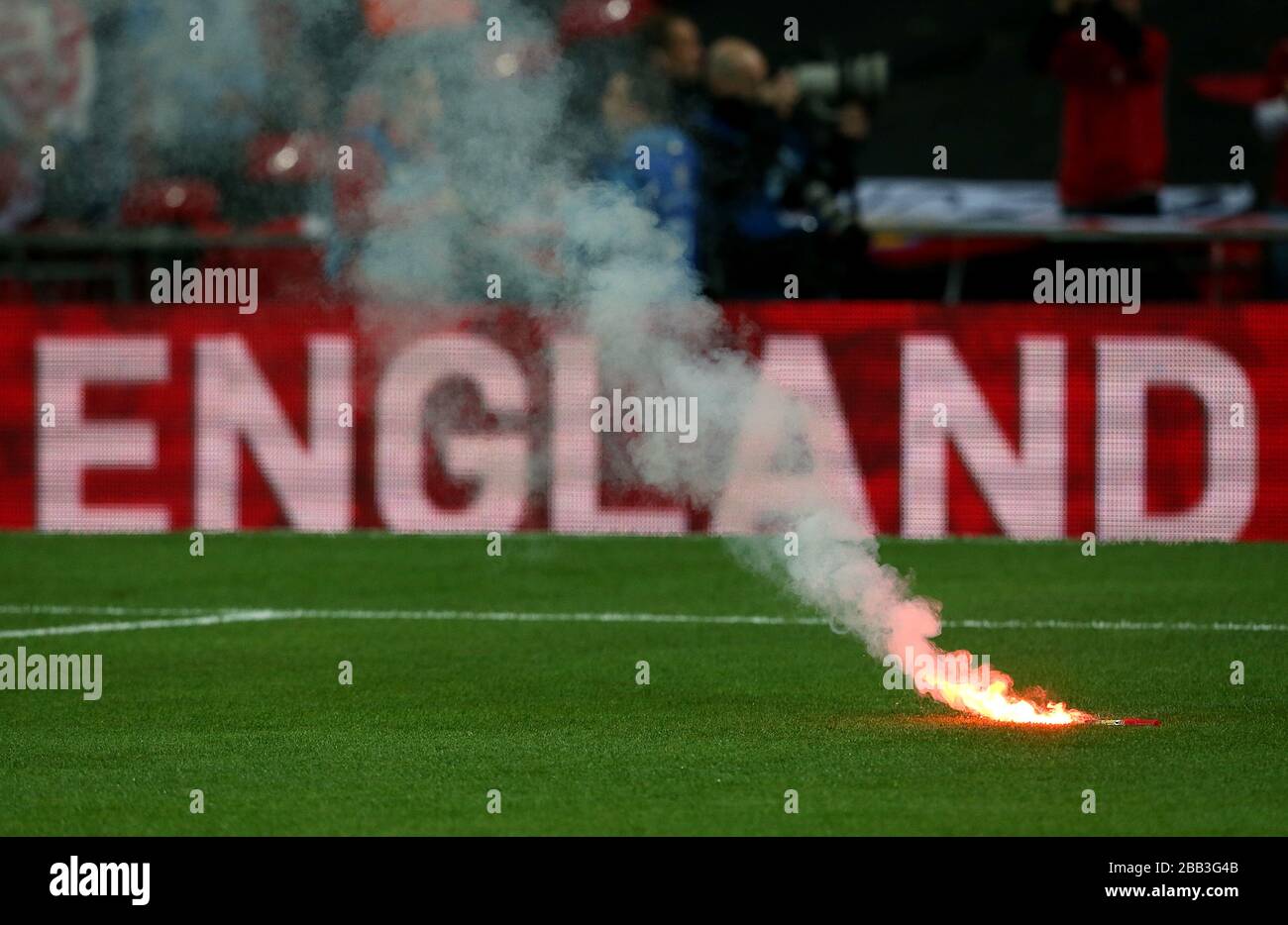 A red flare on the pitch Stock Photo - Alamy