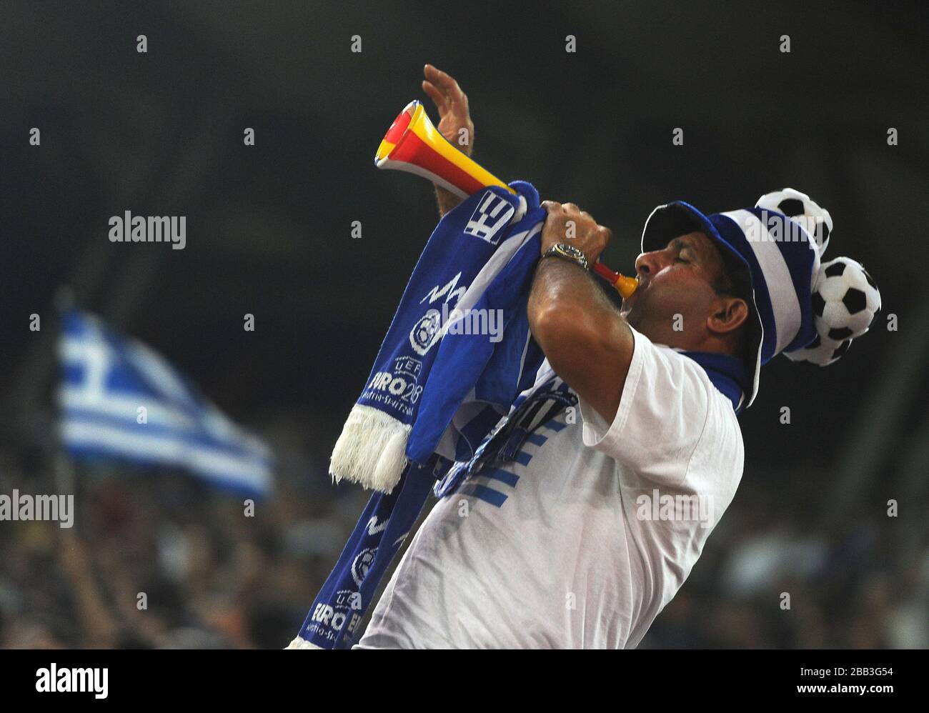 A Greek fan during the game Stock Photo - Alamy