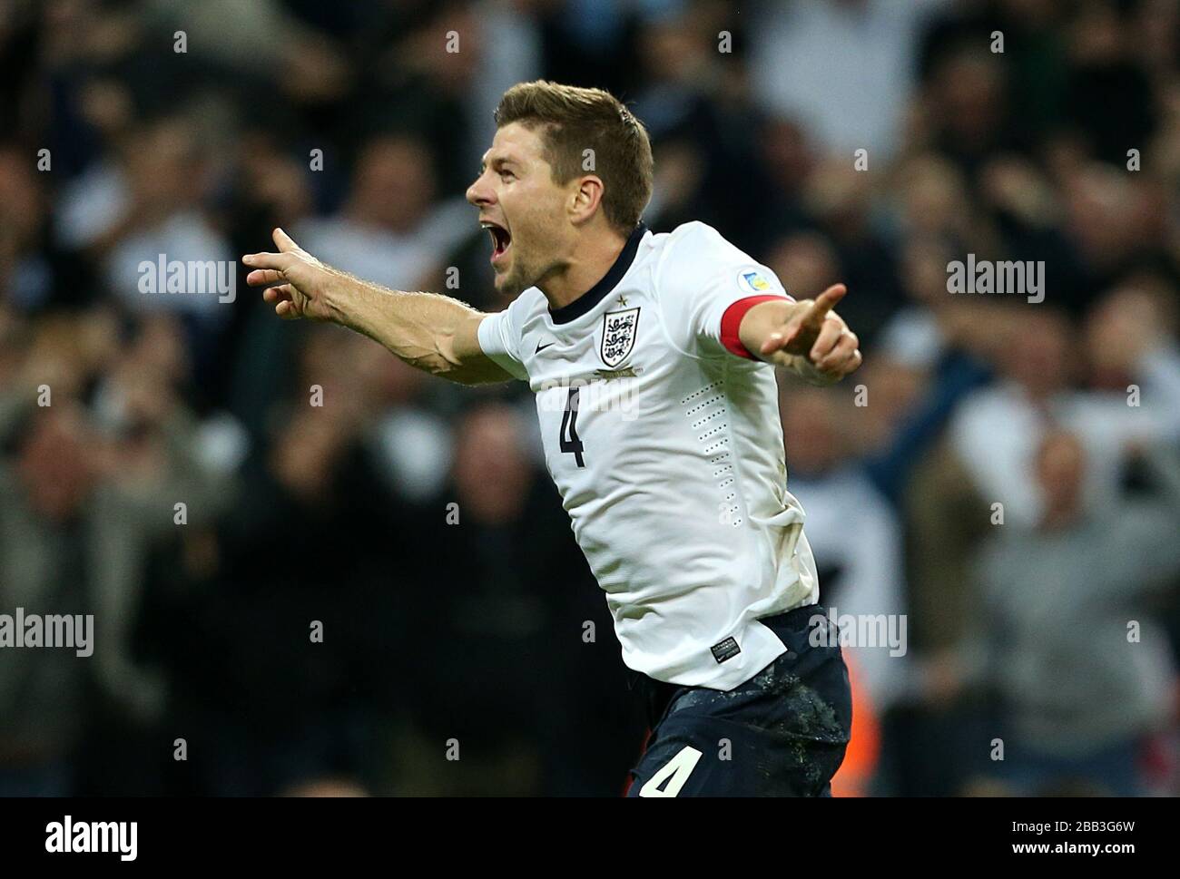 England's Steven Gerrard celebrates scoring his side's second goal ...
