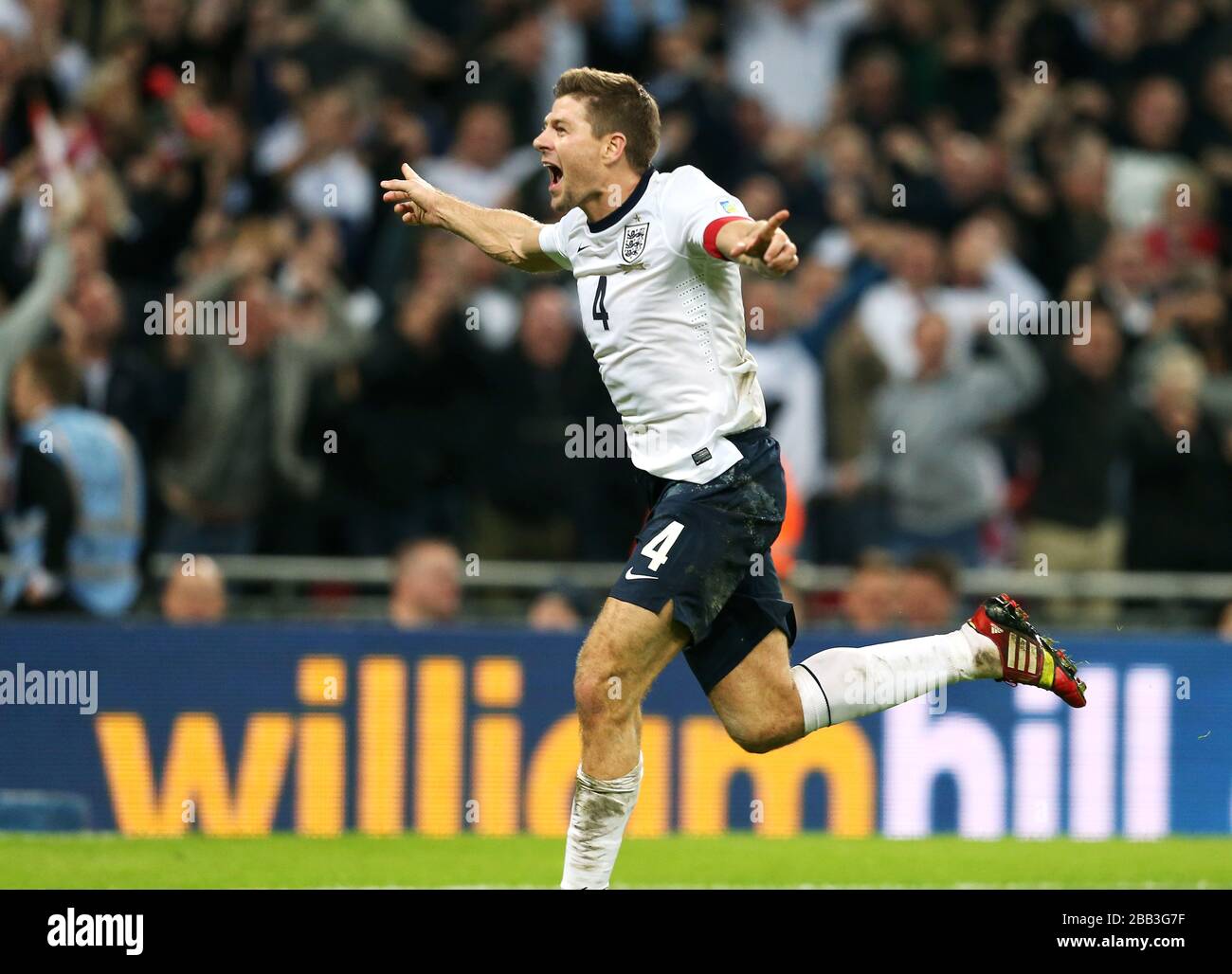 England's Steven Gerrard celebrates scoring his side's second goal ...