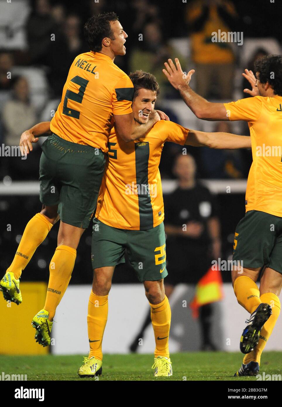 Australia's Dario Vidosic (centre) celebrates with Lucas Neil (left ...