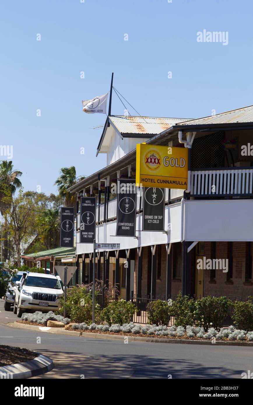 A covered veranda walkway under the Cunnamulla Hotel provides shade for ...