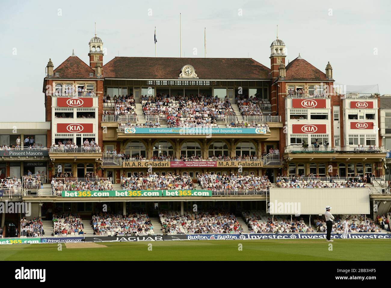 The crowds enjoy the action from The Pavilion at the Kia Oval Stock ...