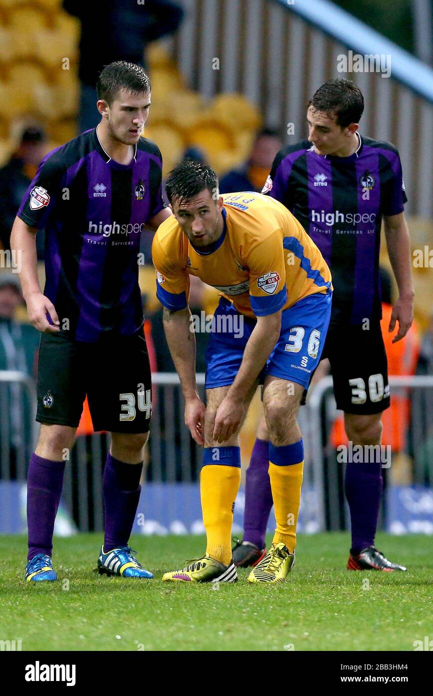 Mansfield Town's Ollie Palmer is closely watched by Bristol Rovers' Pat ...