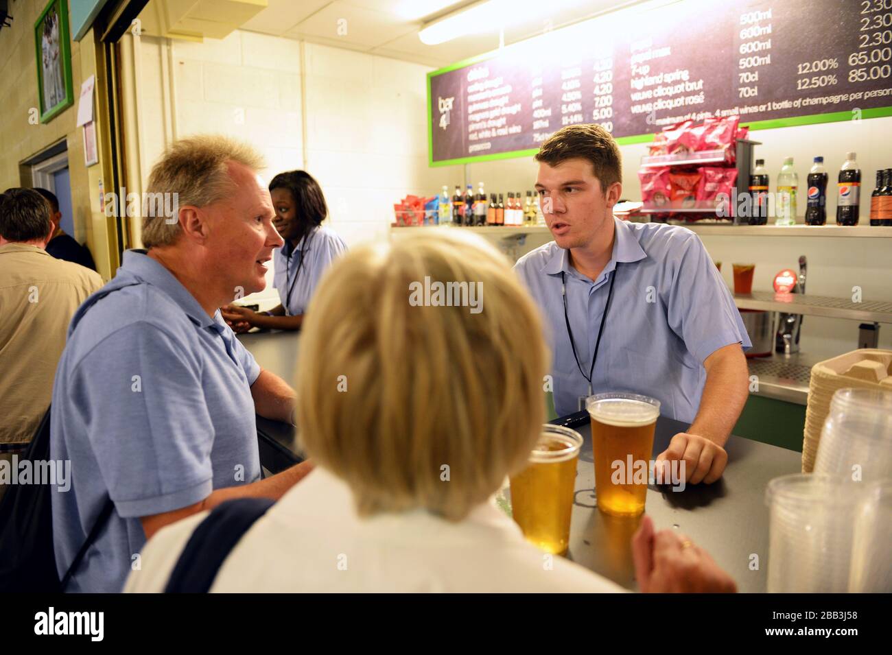 Bar staff at work at the Kia Oval Stock Photo - Alamy