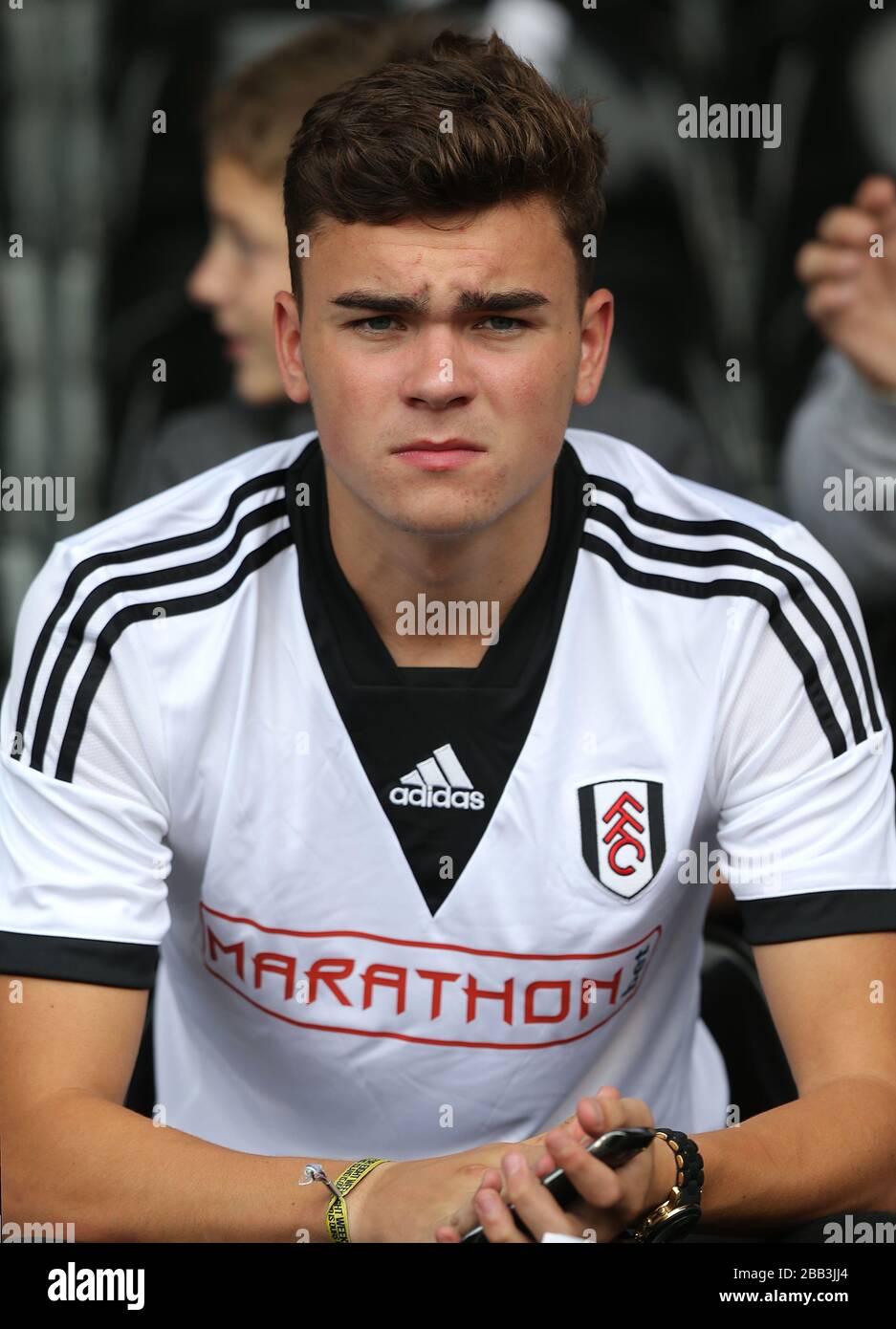 A Fulham fan wearing the new adidas home kit in the stands Stock Photo ...