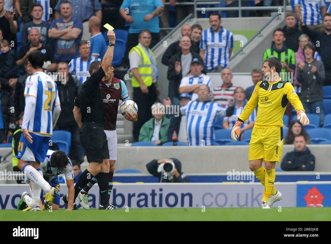 Burnley's goalkeeper Tom Heaton is shown a yellow card Stock Photo - Alamy