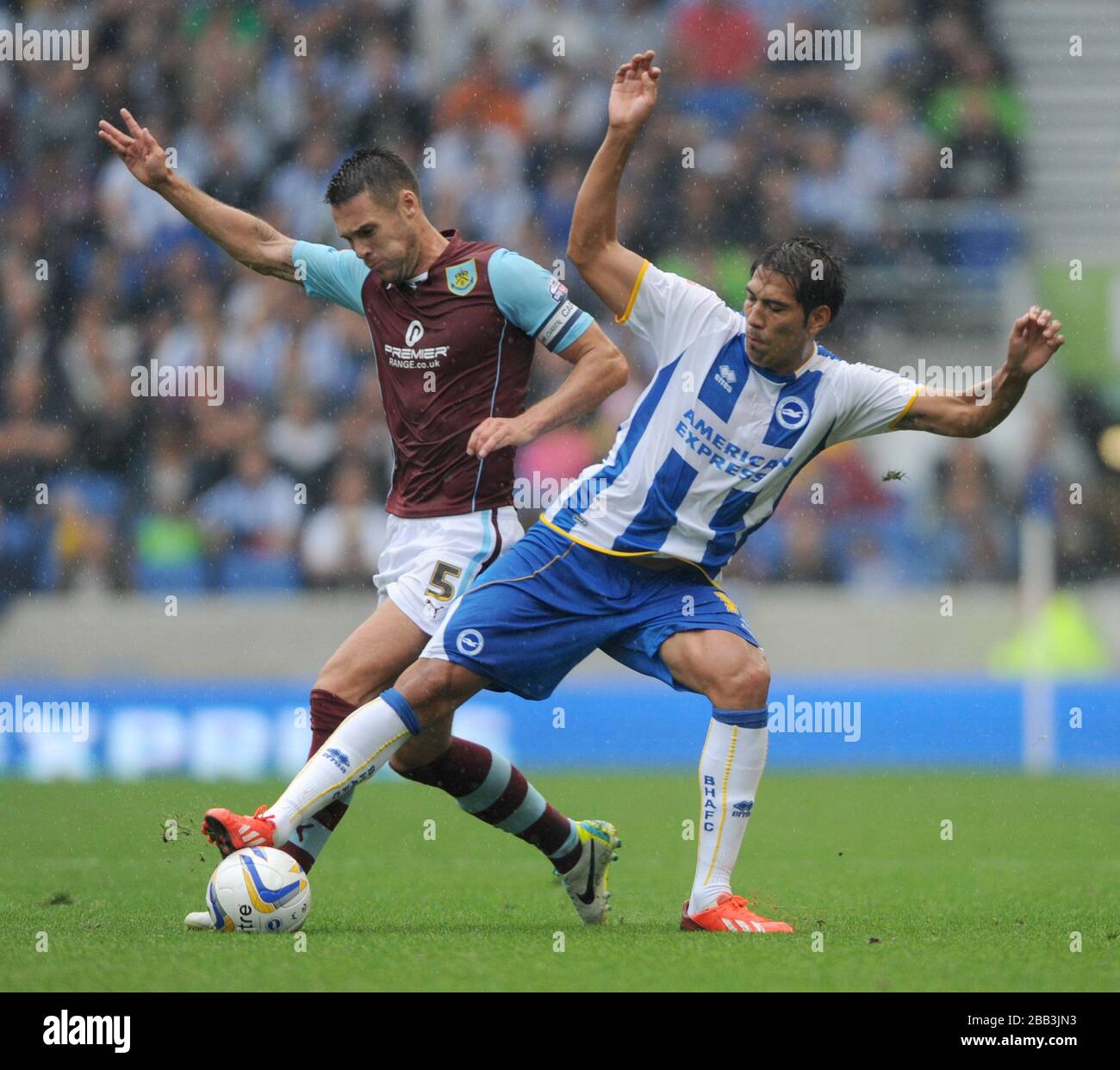 Brighton and Hove Albion's Leonardo Ulloa and Burnley's Jason Shackell ...