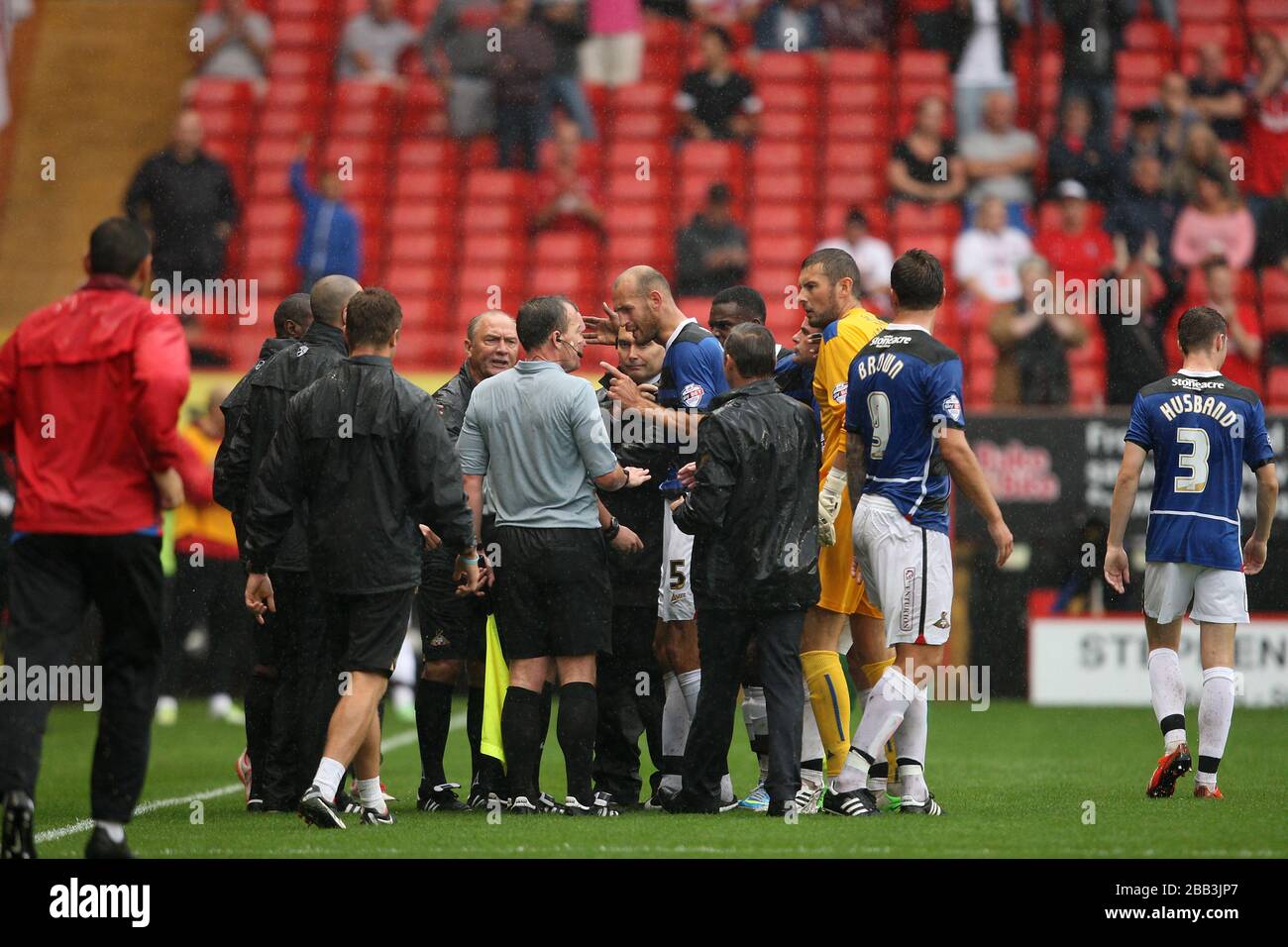 Doncaster Rovers' players argue with Referee Lee Collins after he ...