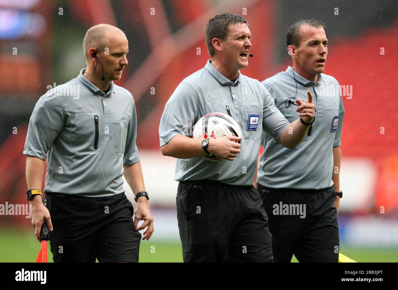 Referee Lee Collins abandons the game due to a waterlogged pitch at ...