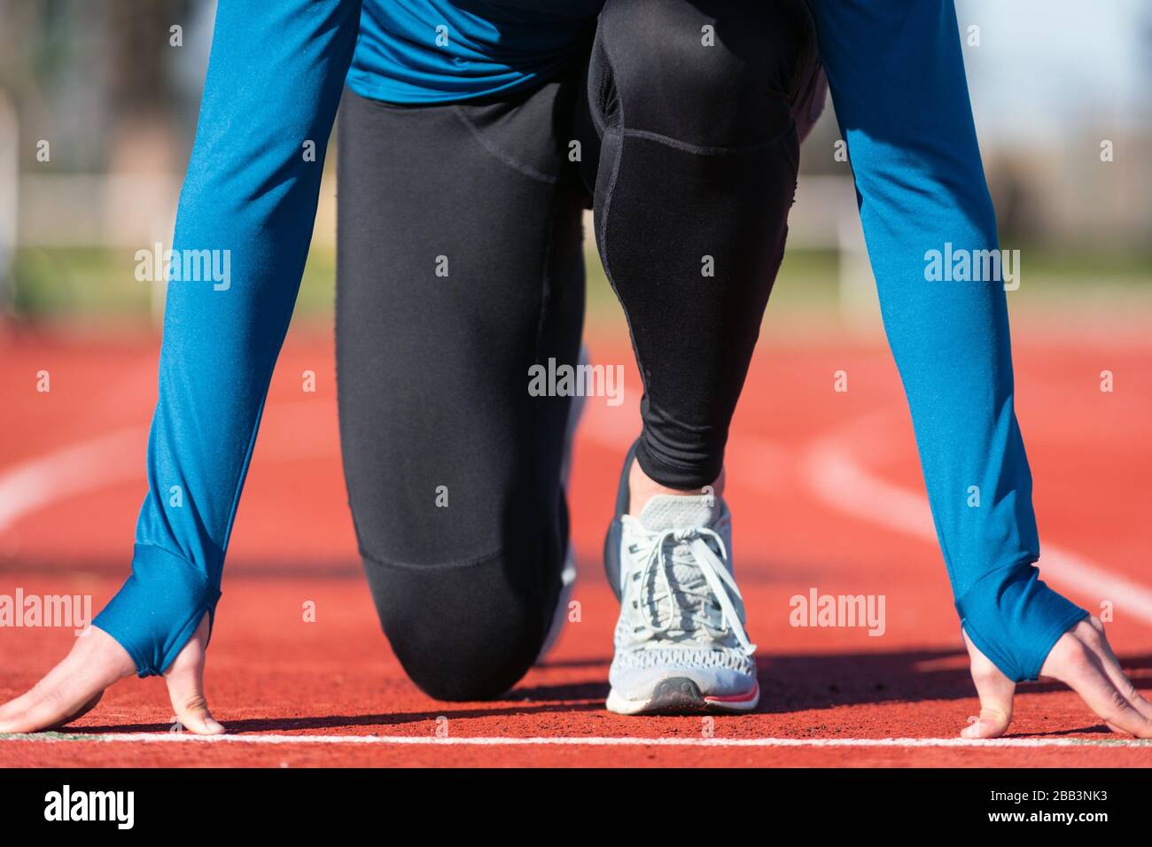 Male athlete on a running track hi-res stock photography and images - Alamy