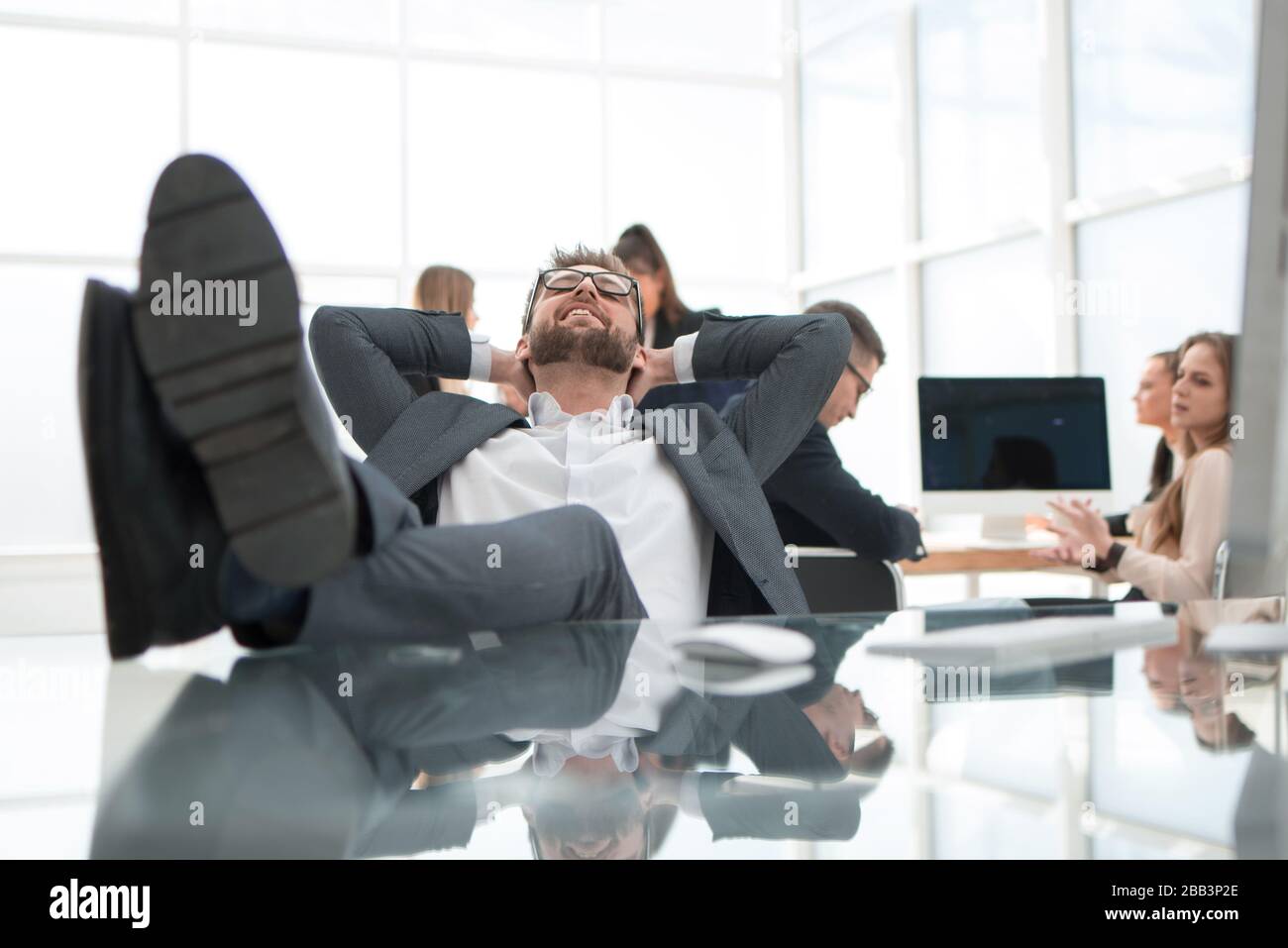 Man Sitting With Feet Up On Table High Resolution Stock Photography and ...