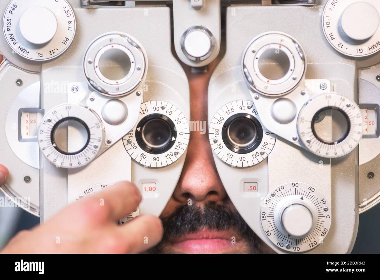 Checking eye hi-res stock photography and images - Alamy