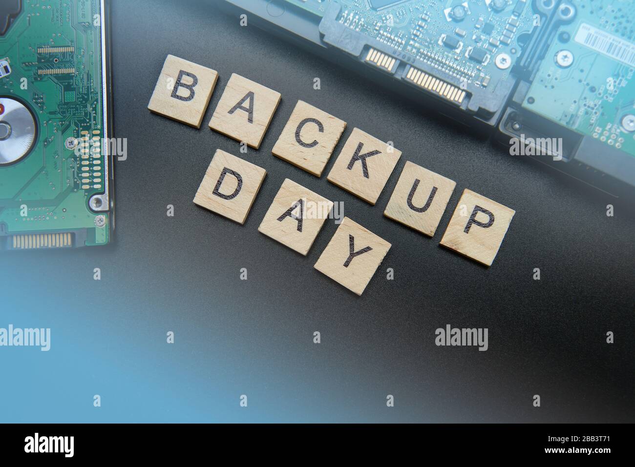 hard disk on black dark background with selective focus and crop ...