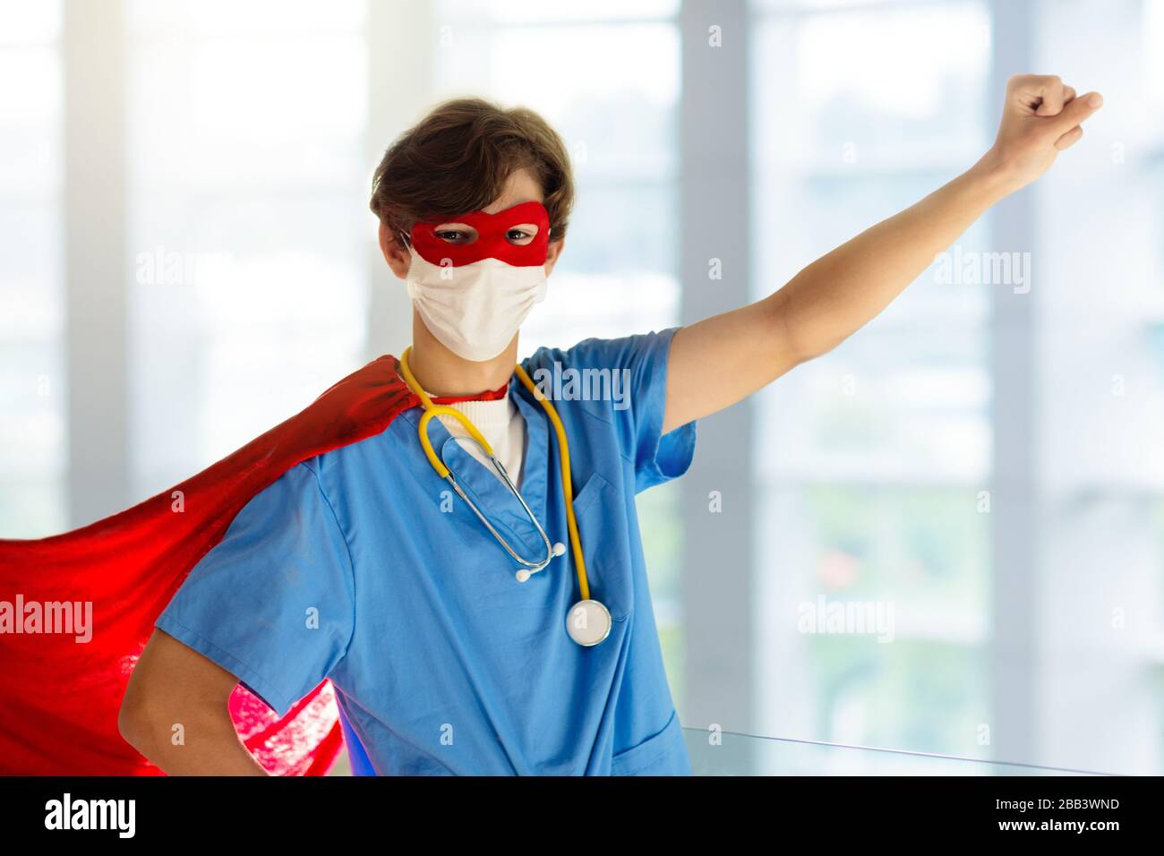 Doctor or nurse wearing surgical face mask in superhero cape. Medical ...