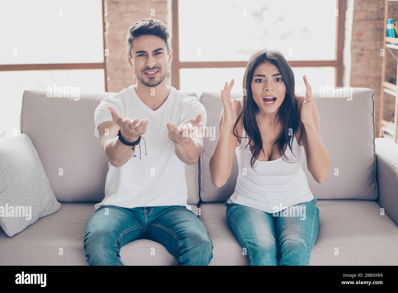 Woman watching sports husband sad hi-res stock photography and images ...