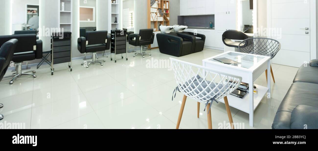 Barber shop interior in black and white colors Stock Photo - Alamy