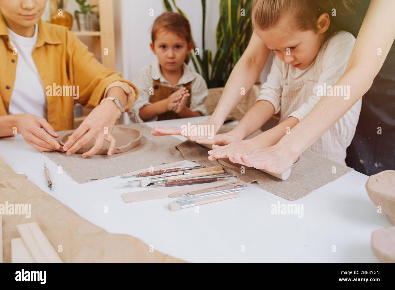 Child clay modeling class hi-res stock photography and images - Alamy