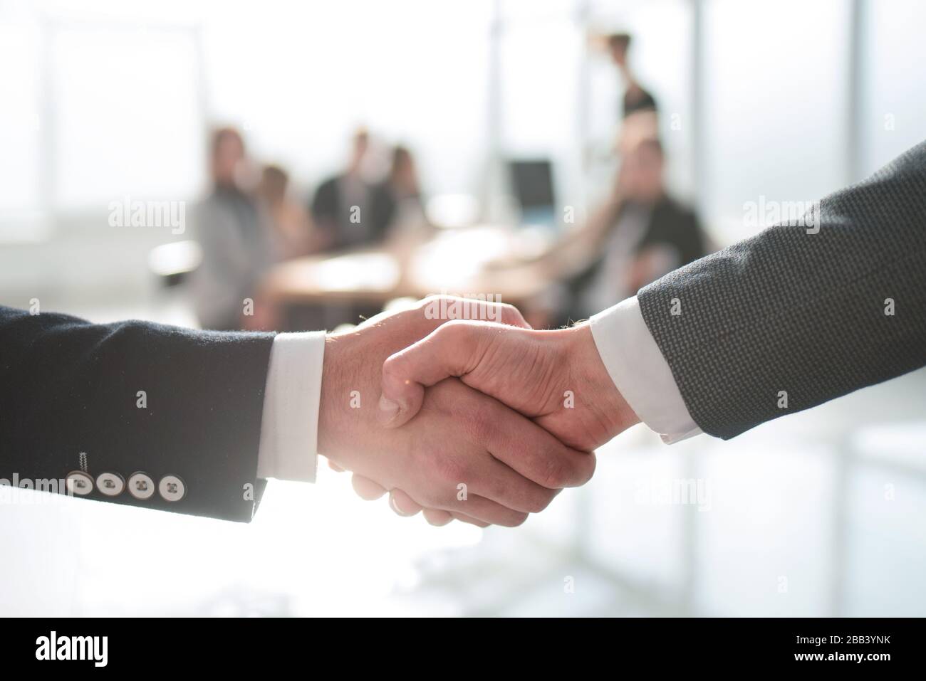 close up. handshake of business people on an office background Stock ...