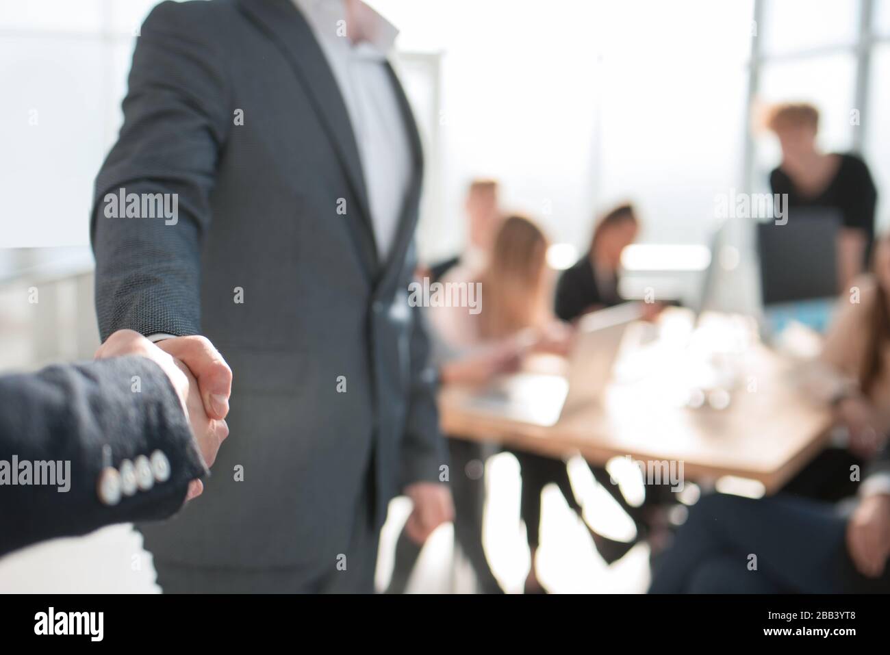 close up. business handshake on an office background Stock Photo - Alamy