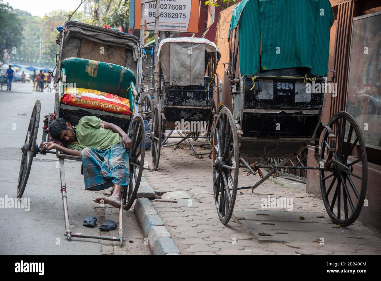 Hand pulled rickshaw hi-res stock photography and images - Alamy