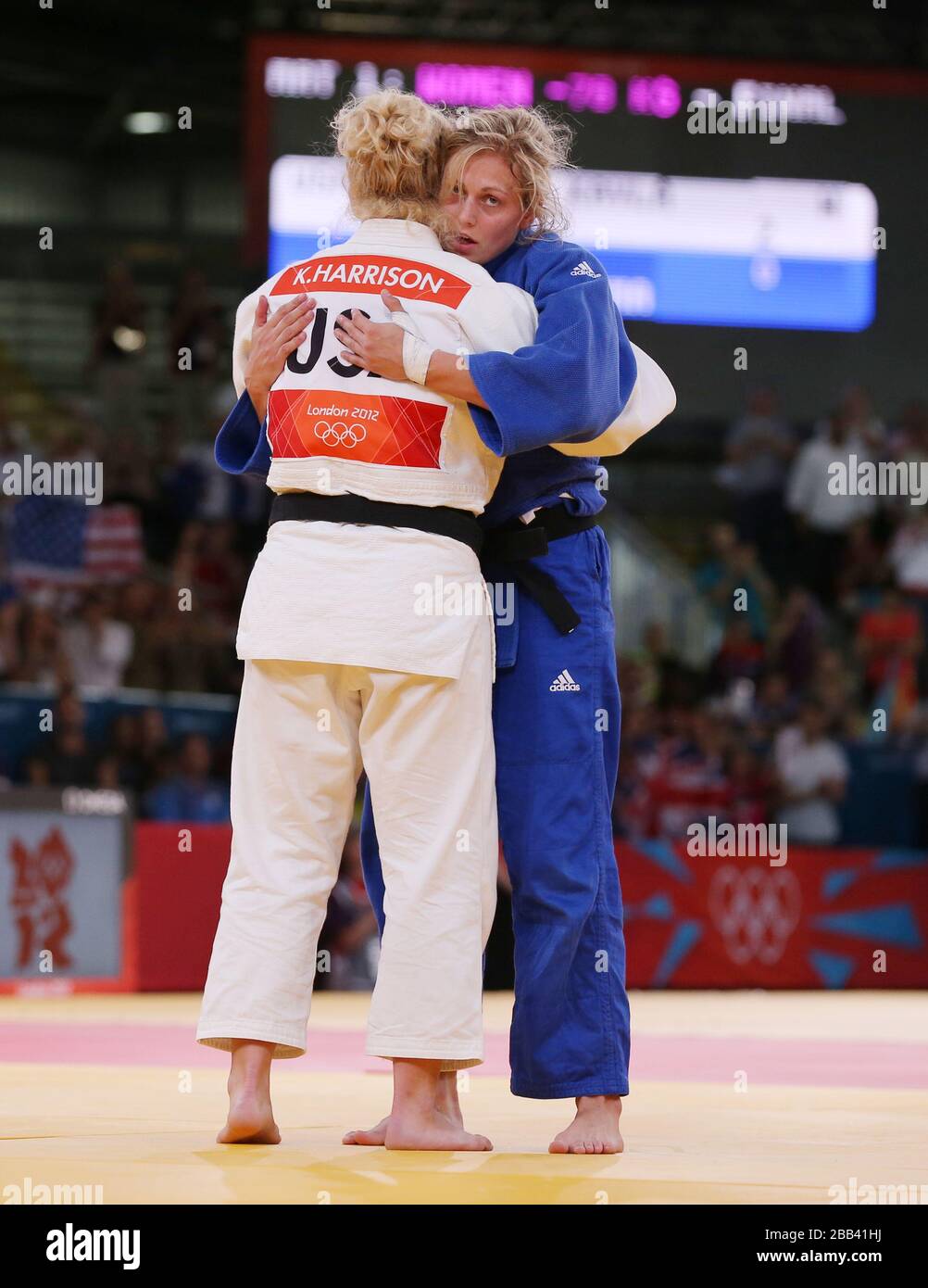 Great Britain's Gemma Gibbons (right) hugs the gold medal winner USA's ...