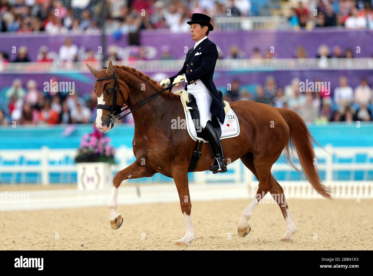 Japan's 71 year-old Hiroshi Hoketsu riding Whisper as he competes in ...