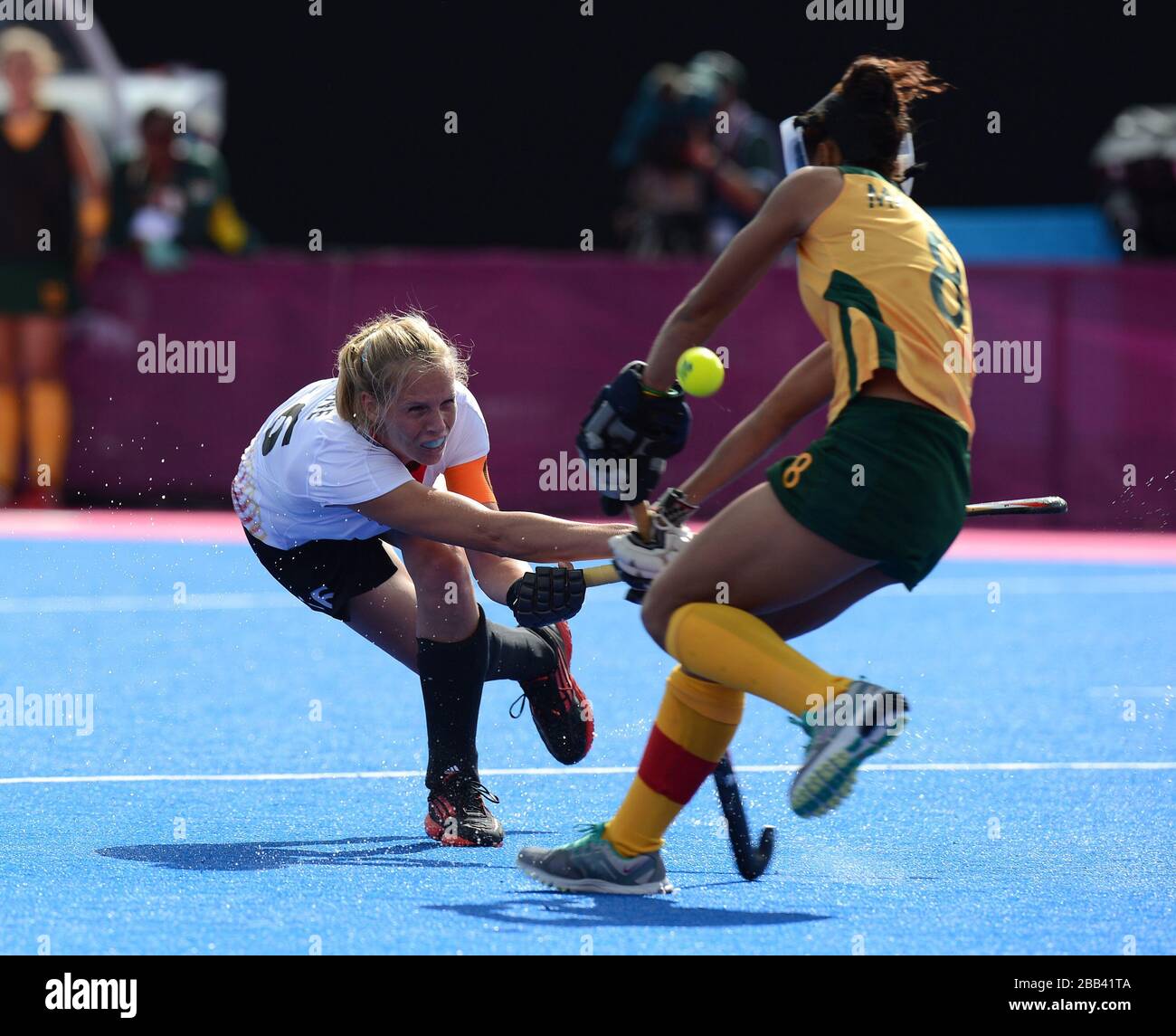 South Africa's Marsha Marescia blocks a shot from Germany's Fanny Rinne ...