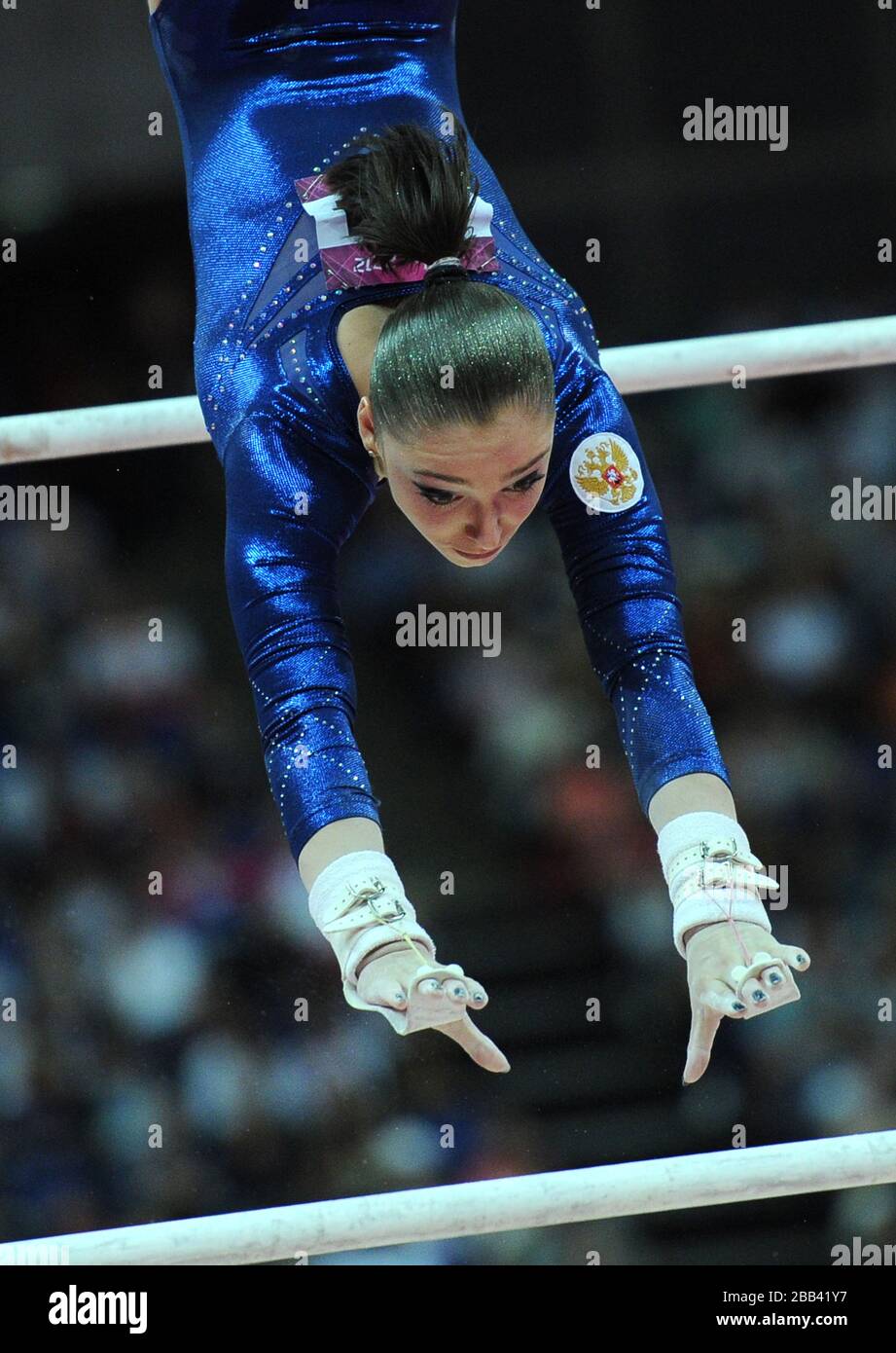 Russia's Aliya Mustafina competes on the uneven bars during the ...