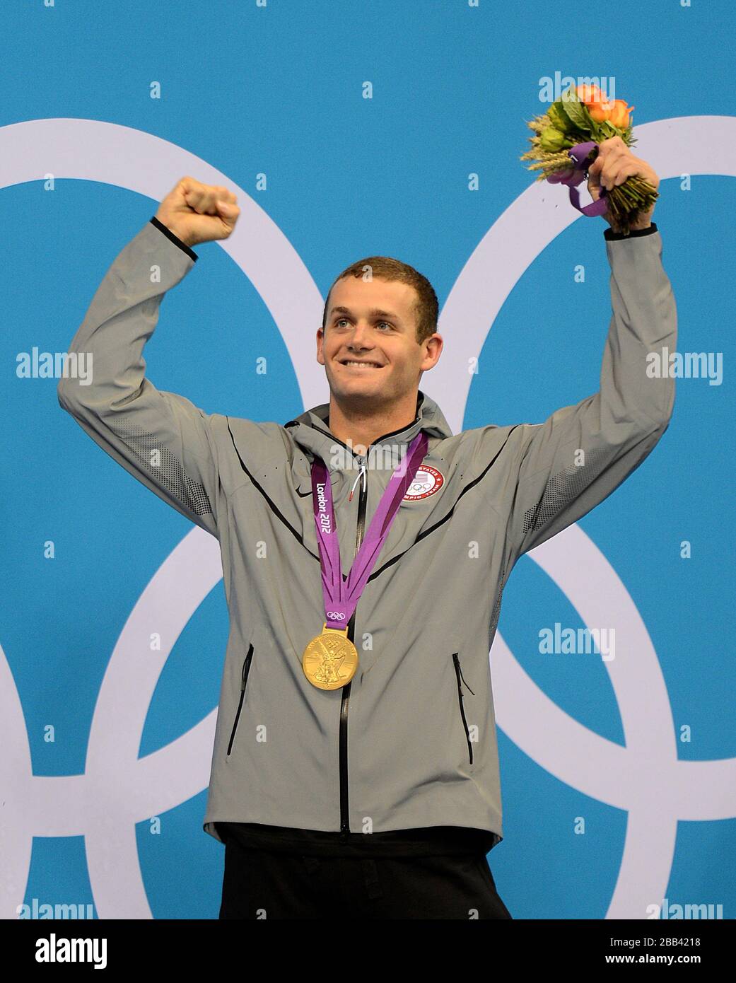 USA's Tyler Clary celebrates with his Gold Medal after winning the Men ...