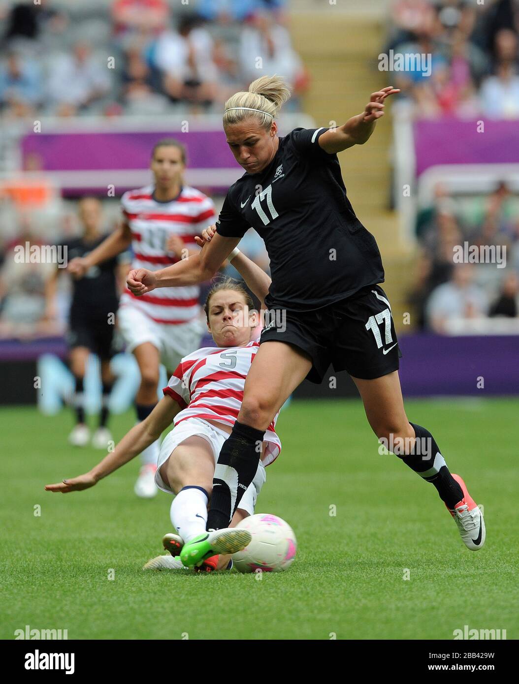 USA's Kelley O'Hara (left) and New Zealand's Hannah Wilkinson battle ...
