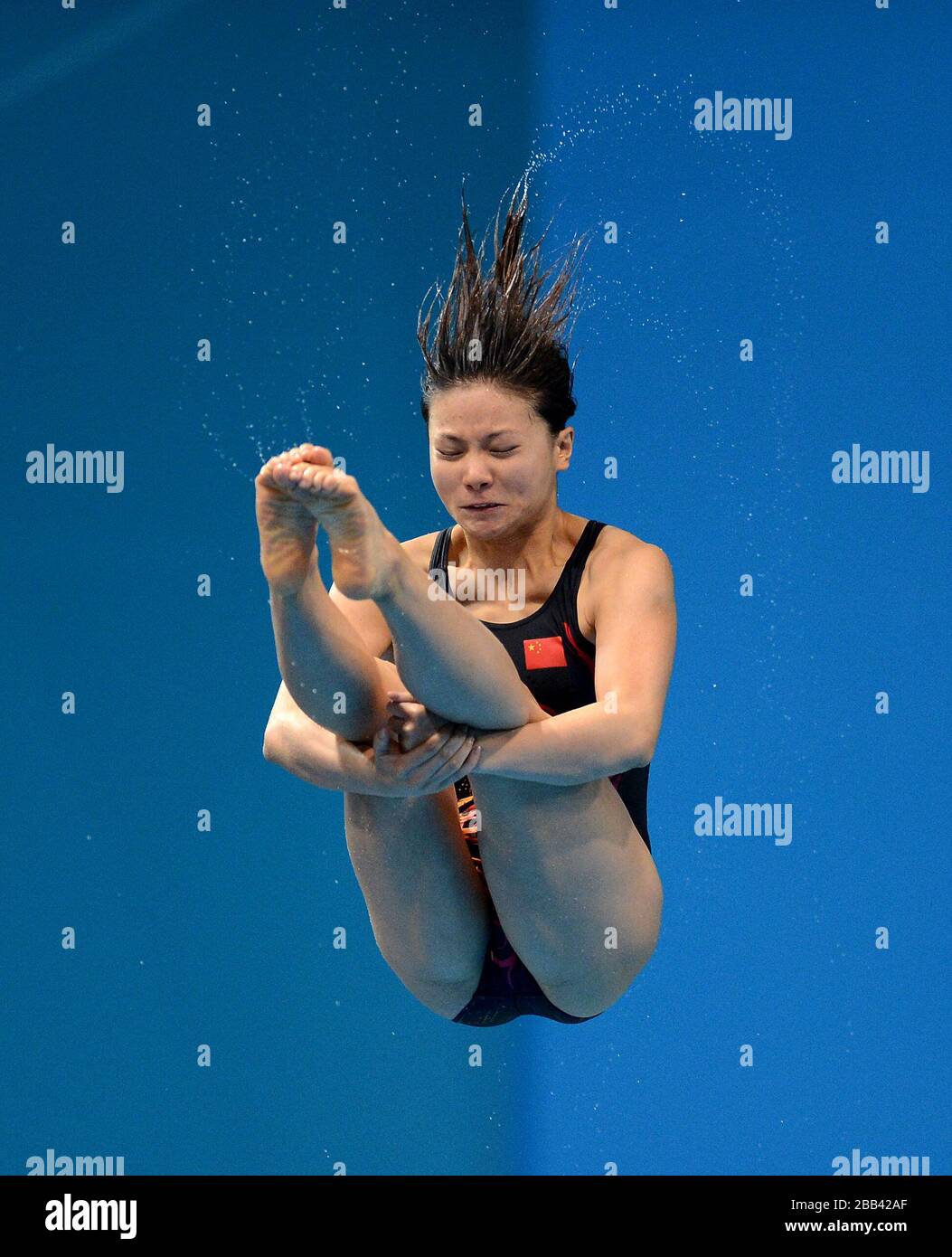 China's He Zi in action during the Women's 3m Springboard Preliminary ...