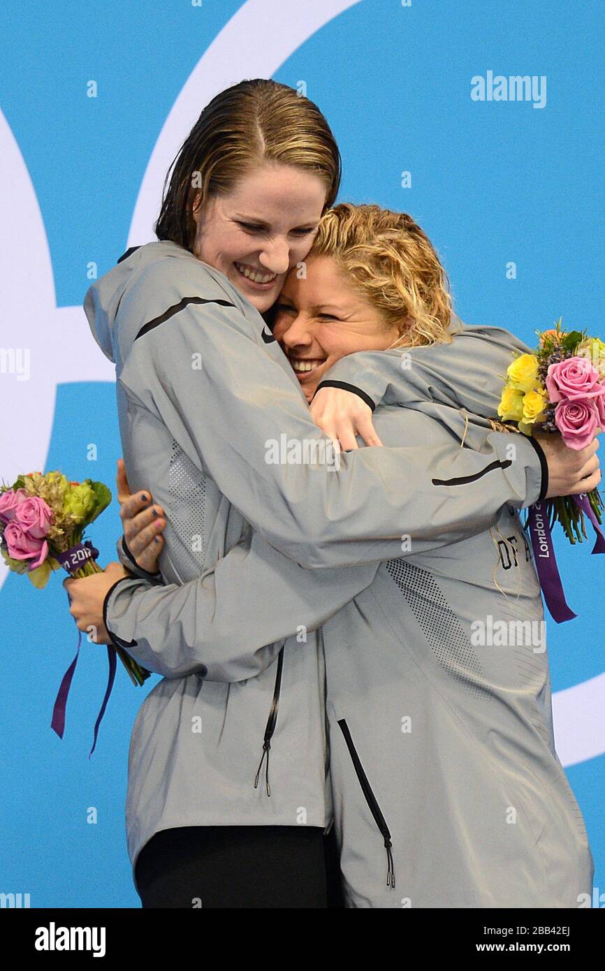 USA's Missy Franklin and compatriot Elizabeth Beisel (right) embrace ...