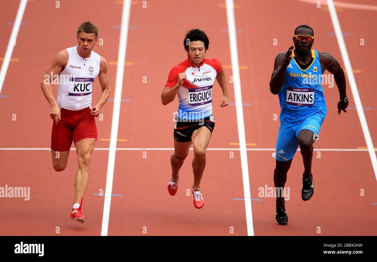 Japan's Masashi Eriguchi (centre) with Bahamahs Derrick Atkins and ...