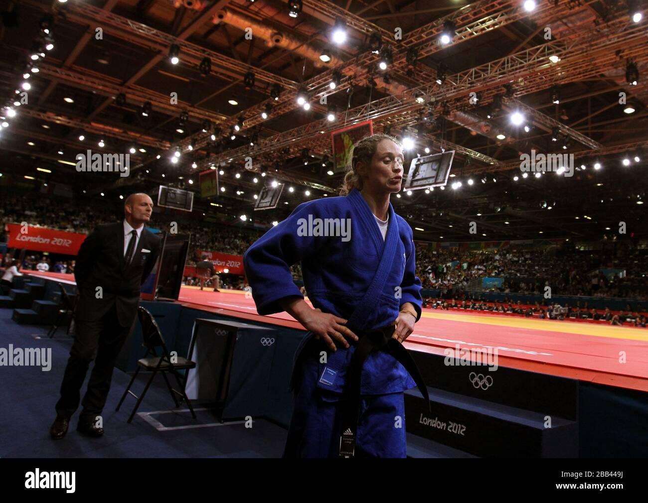 Great Britain's Sarah Clark with coach Billy Cusack (left) after she ...