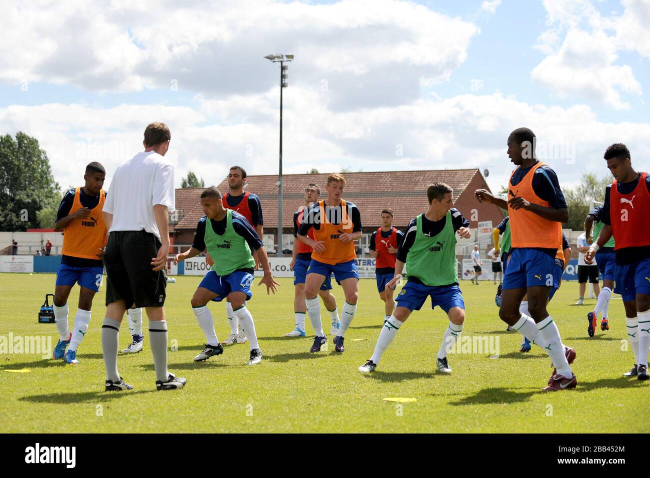 Coventry City assistant physiotherapist Sam Heathcote (left) oversees ...