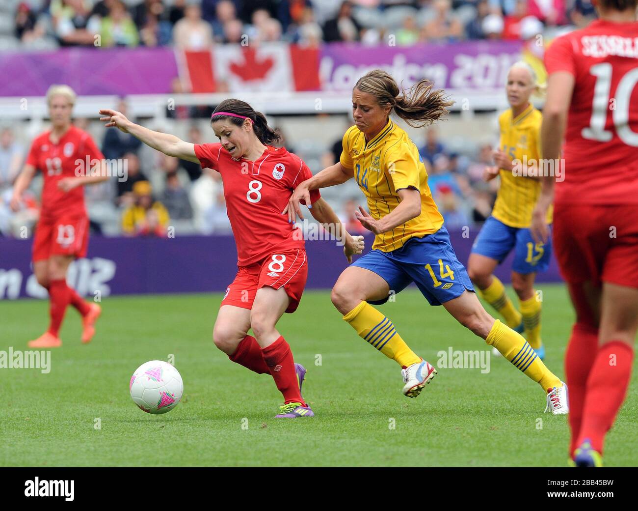 Canada's Diana Matheson (left) and Sweden's Johanna Almgren battle for ...