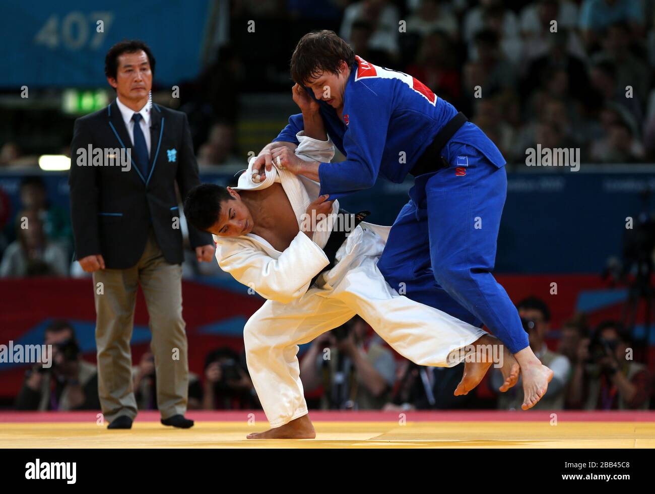 Russia's Judo player Ivan Nifontov (blue) during his bronze medal win in the 81kg against Japan ...