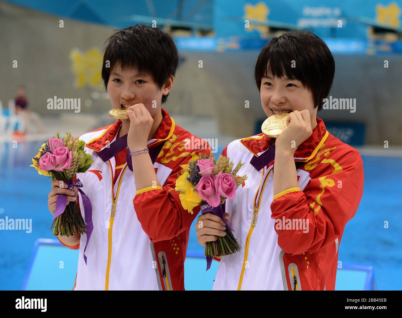 China's Chen Ruolin and Wang Hao with their Gold medals from the Women ...