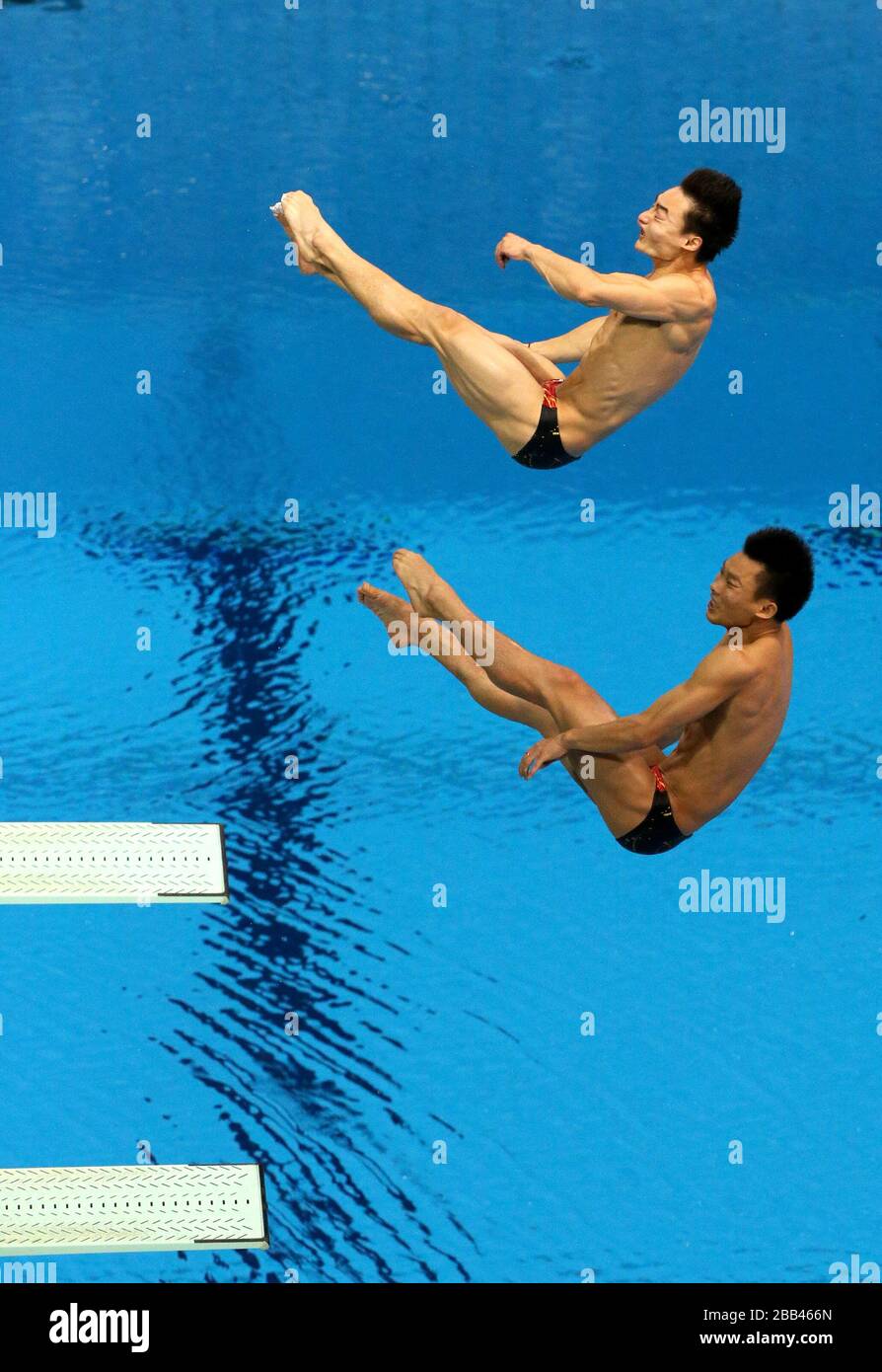 Kai Qin and Yutong Luo of China compete in the Men's Synchronised 3m ...