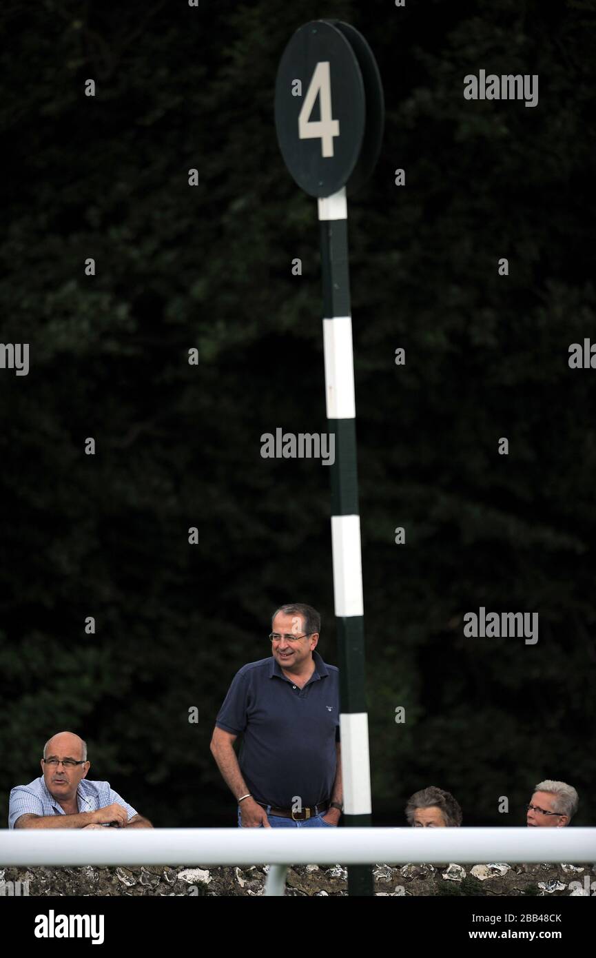 Racegoers at the 4 furlong post Stock Photo - Alamy