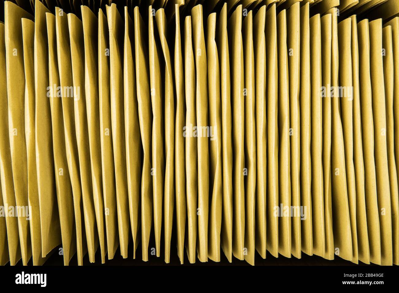 Stack of bubble envelopes inside a box. Close up, top view Stock Photo ...