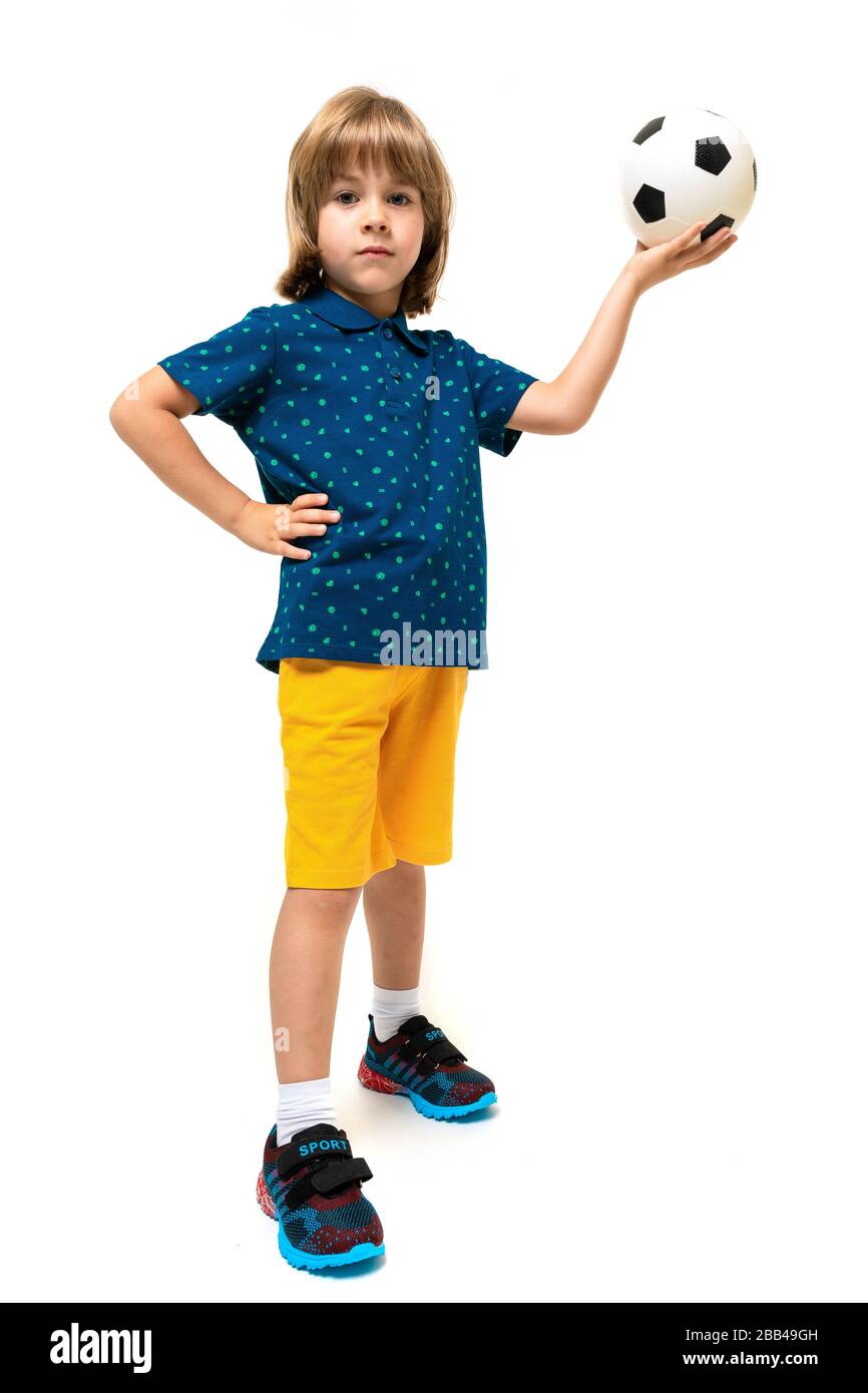 sport boy holds a soccer ball in his hands on a white background Stock ...
